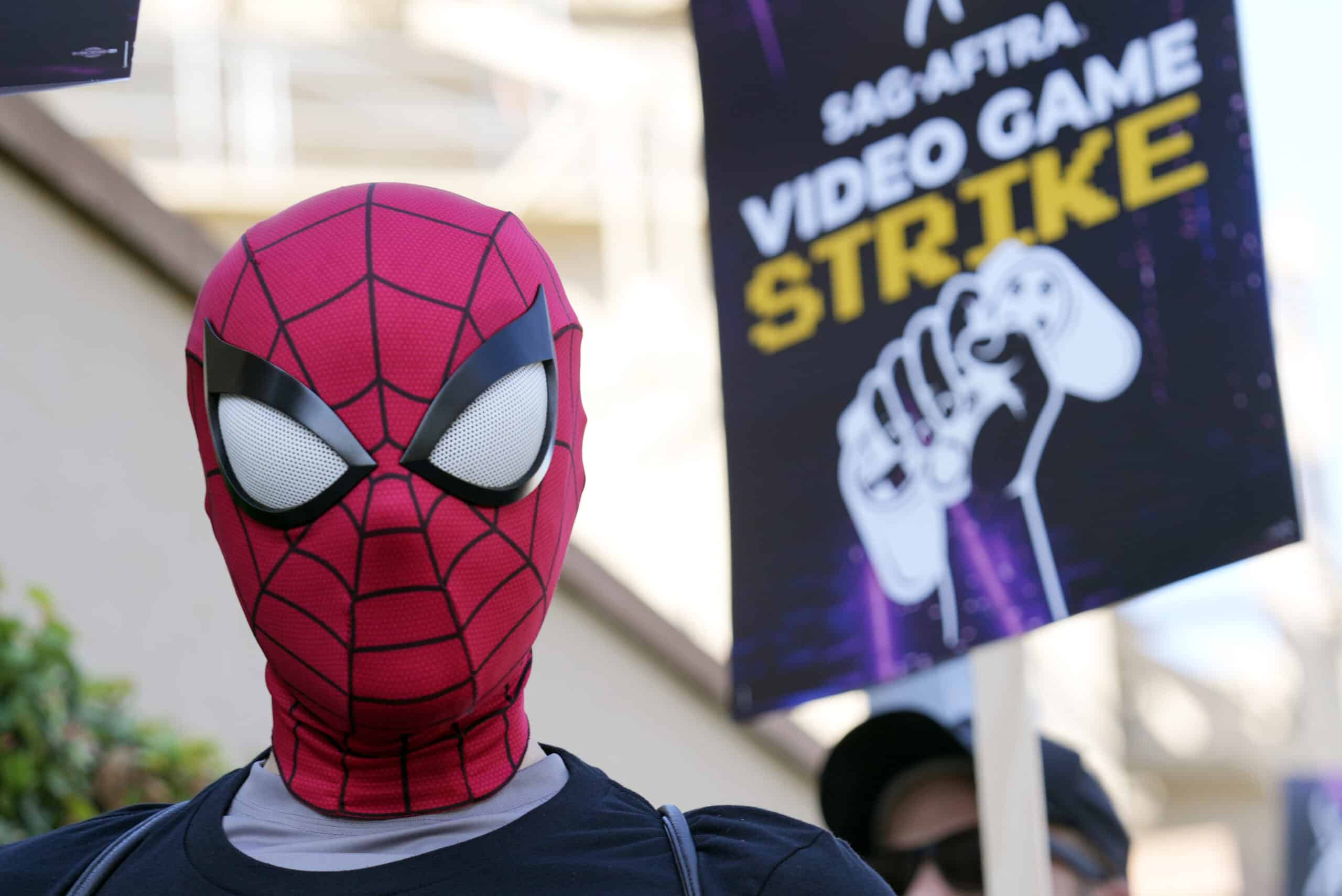 Striking video-game actors picket at Warner Bros. Studios over AI