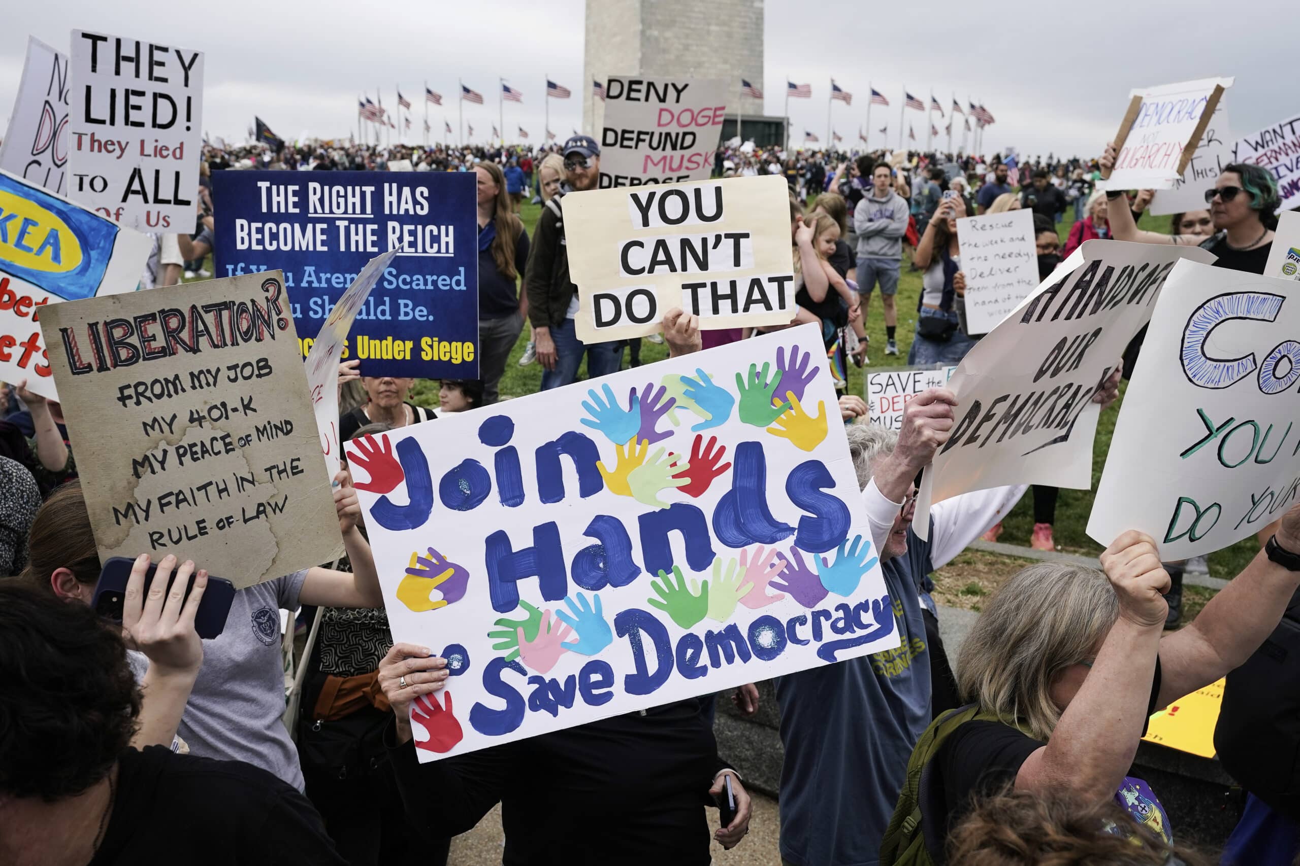 'Hands off!' protesters across US rally against Trump, Musk